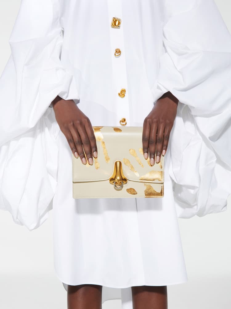 Schiaparelli Handprint Nose Bag | Haute Couture Designer | Coveti
